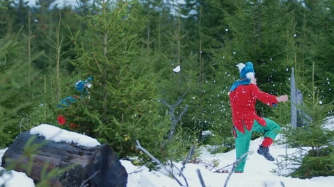 Christmas elves running in the woods | Stock Video | Pond5