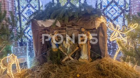 Christmas nativity scene with baby Jesus, Mary and Joseph in the manger ...