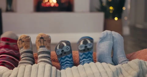Christmas, socks and family toes by the ... | Stock Video | Pond5