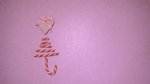 Christmas tree made of sweets on a plain... | Stock Video | Pond5