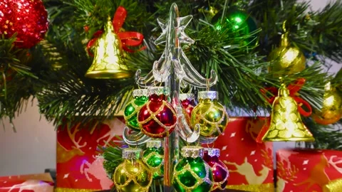 Christmas tree rotates on the background... | Stock Video | Pond5