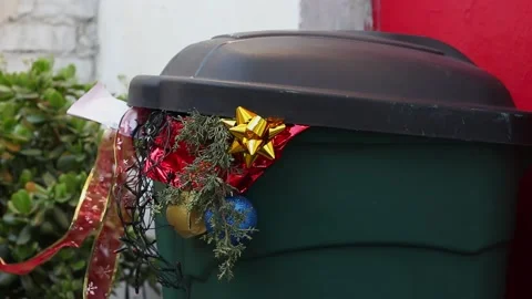 Christmas waste in a dumpster. Pollution... | Stock Video | Pond5