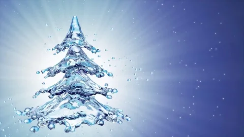 Christmas water splash tree on blue back... | Stock Video | Pond5