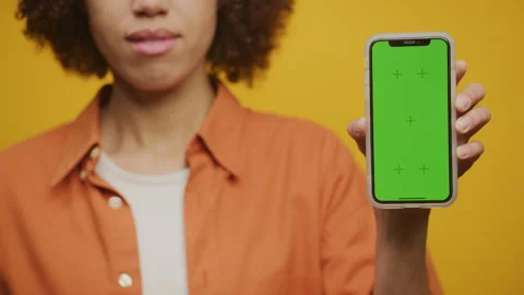 Chroma Key Smartphone on Yellow Backgrou... | Stock Video | Pond5