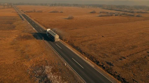 Chrome Tank Truck Driving Past Beautiful... | Stock Video | Pond5