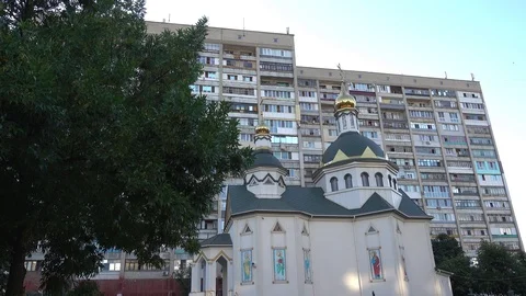 Church in front of a high-rise apartment... | Stock Video | Pond5
