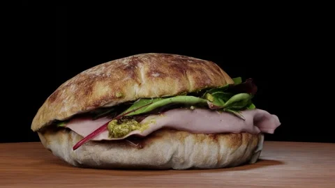 Ciabatta Sandwich Rotating In A Seamless... | Stock Video | Pond5