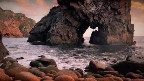 Cinemagraph Loop - Rock Arch and Pebbles... | Stock Video | Pond5
