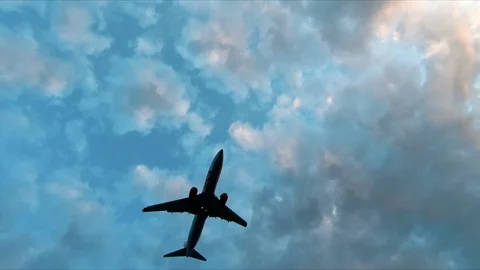 Cinematic Passenger Jet Airplane Flying ... | Stock Video | Pond5