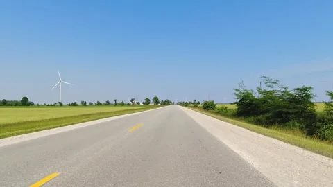 Cinematic POV shot of asphalt road at co... | Stock Video | Pond5