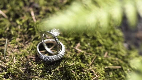 Cinematic shoot of wedding rings | Stock Video | Pond5
