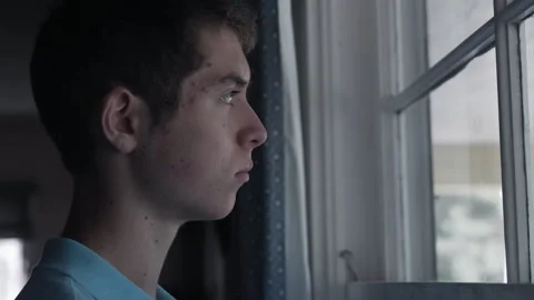 Cinematic shot of the face of a sad youn... | Stock Video | Pond5