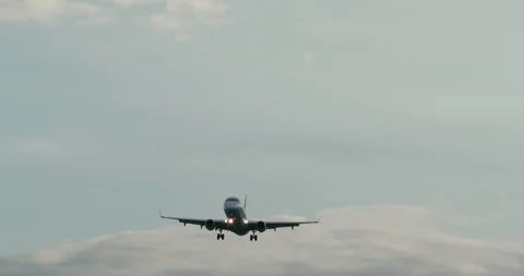 Cinematic shot of a passenger jet airpla... | Stock Video | Pond5