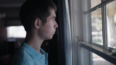 Cinematic shot of a sad young teenage bo... | Stock Video | Pond5