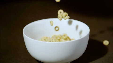 Circle shaped breakfast cereals falling,... | Stock Video | Pond5