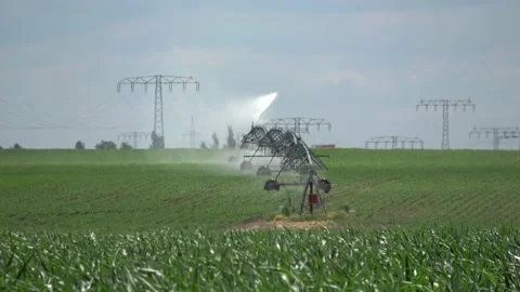 a circular irrigation machine irrigates ... | Stock Video | Pond5
