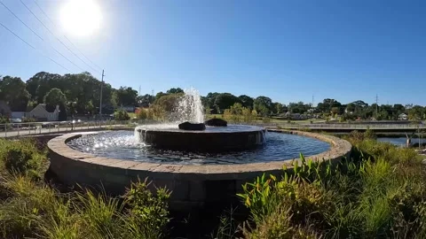 a circular water fountain in a gorgeous ... | Stock Video | Pond5
