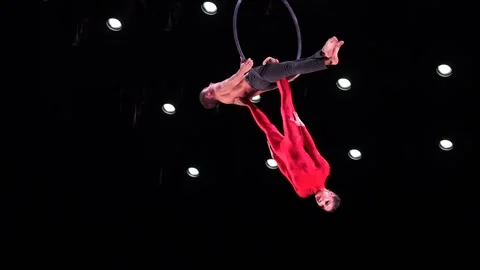 Circus aerial hoop duo with on black sta... | Stock Video | Pond5