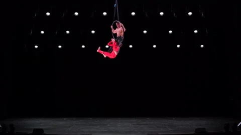 Circus aerial hoop duo with on black sta... | Stock Video | Pond5
