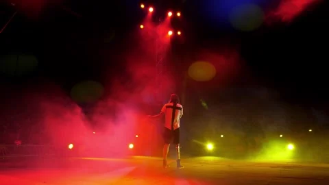 A circus presenter with a microphone in ... | Stock Video | Pond5