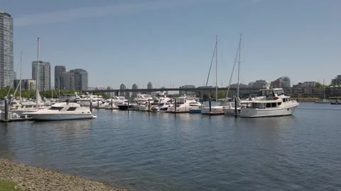City Skyline, Waterfront Fun, and Yachts... | Stock Video | Pond5