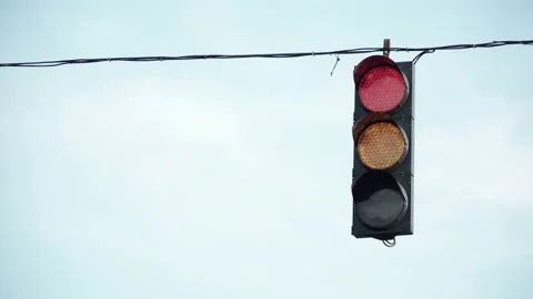 City traffic light hanging on the wire | Stock Video | Pond5