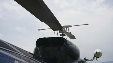 Civil helicopter chopper rotor blades on... | Stock Video | Pond5
