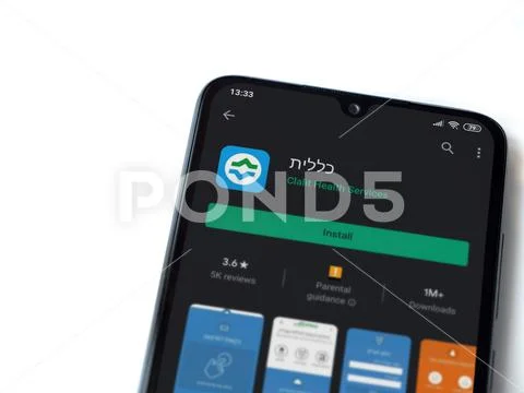 Clalit Health Services app play store page on the display of a black ...