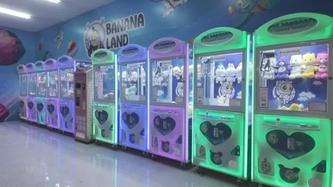 Claw machine shop with cute dolls at sho... | Stock Video | Pond5