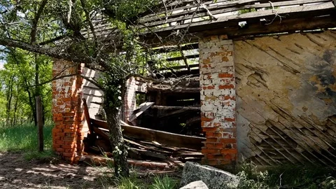 The clay and brick shed is destroyed by ... | Stock Video | Pond5