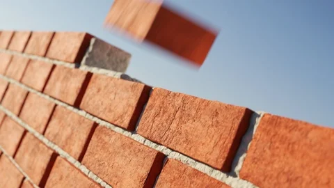 Clay brick wall being build. | Stock Video | Pond5