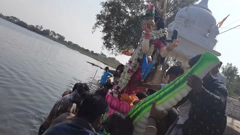 Clay Idol of Goddess Narmada going for i... | Stock Video | Pond5