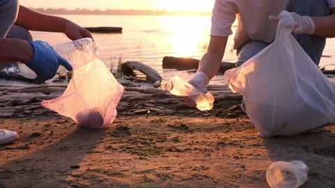 Clean up plastic on the beach. Plastic p... | Stock Video | Pond5