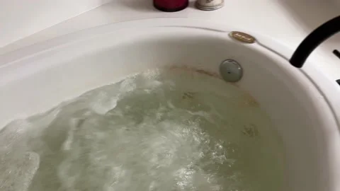 Cleaning dirty Jacuzzi jetted tub, bio-f... | Stock Video | Pond5