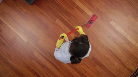 cleaning lady overhead mop | Stock Video | Pond5
