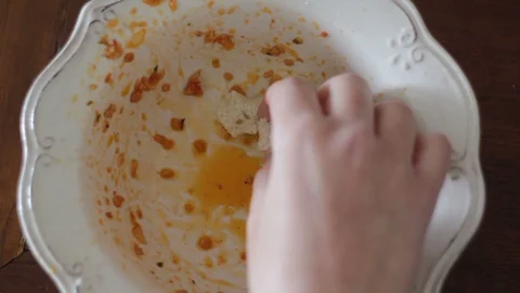 Cleaning Plate with Bread. Top view | Stock Video | Pond5