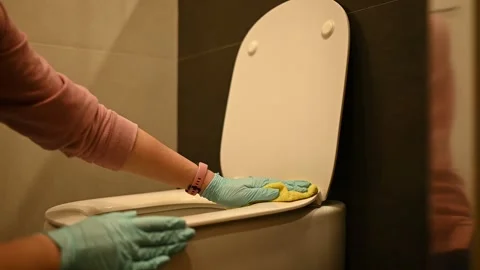 cleaning the toilet, hands wipe the toil... | Stock Video | Pond5