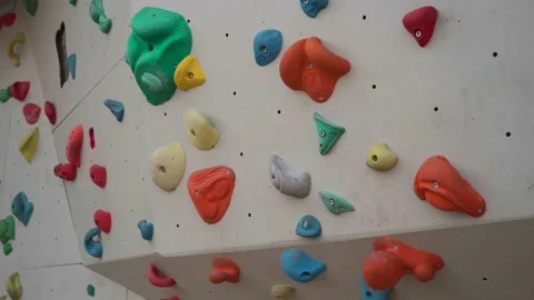 Climbing wall with grips in bouldering c... | Stock Video | Pond5