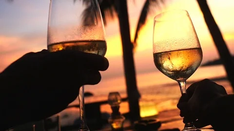Clinking glasses with white wine at amaz... | Stock Video | Pond5