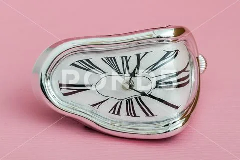 Clock with Distorted Soft Melting Design on Pink Background ~ Premium ...