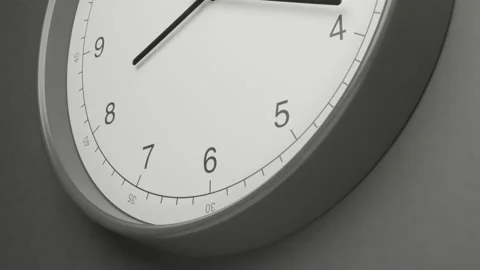 Clock Face on Dark Grey Office Wall in T... | Stock Video | Pond5