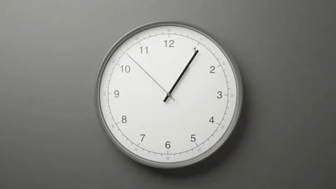 Clock Face on Dark Grey Office Wall in T... | Stock Video | Pond5