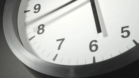 Clock Face in Time Lapse on Dark Grey Wa... | Stock Video | Pond5