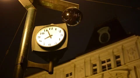 clock on the night street (night city) -... | Stock Video | Pond5