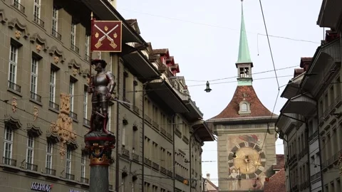 Clock tower and sculpture in Bern old to... | Stock Video | Pond5