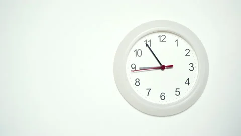 Clock on wall showing nine hours, time l... | Stock Video | Pond5