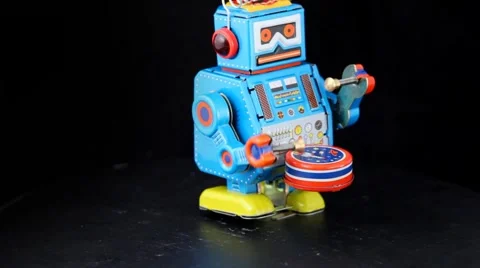clockwork toy robot marching with drum | Stock Video | Pond5