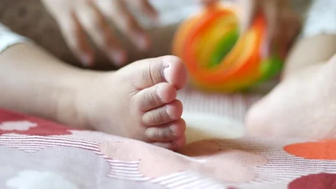 close up of 5 years old child dry feet o... | Stock Video | Pond5