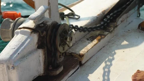 Close-up of the anchor chain sliding on ... | Stock Video | Pond5