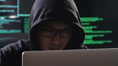 Close Up Of Asian Male Hacker In A Hood ... | Stock Video | Pond5